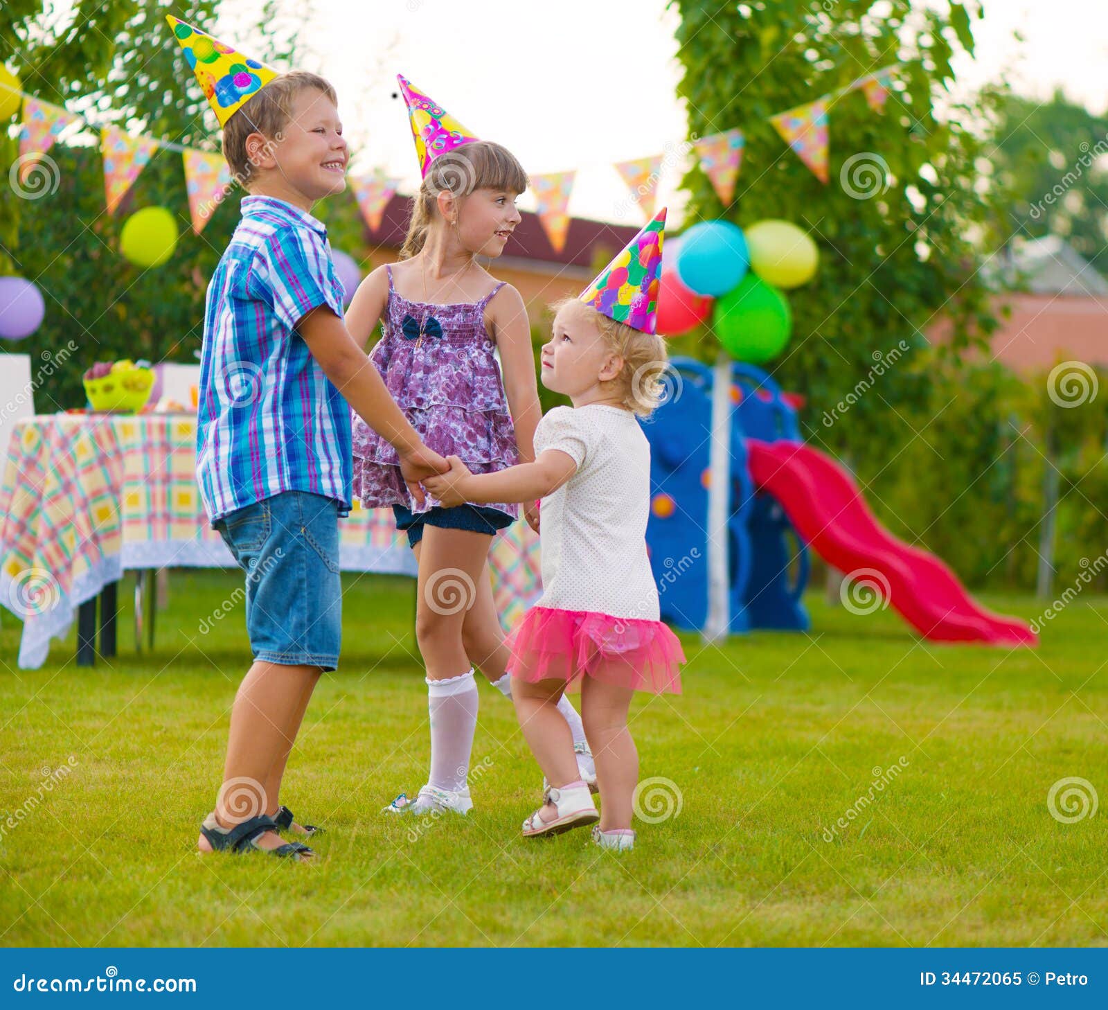 Three Little Kids Dancing Roundelay Stock Image - Image of cheerful ...