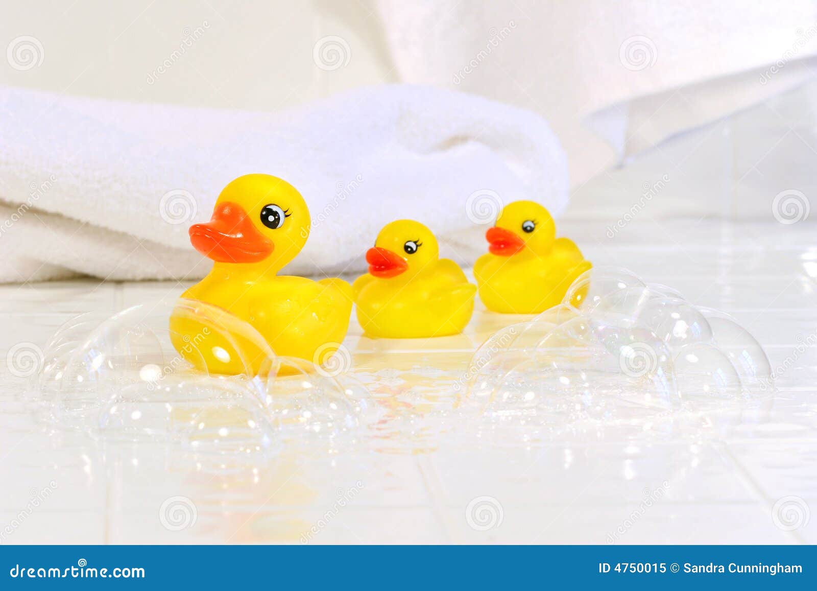 Three little rubber ducks stock image. Image of ducky - 4750015