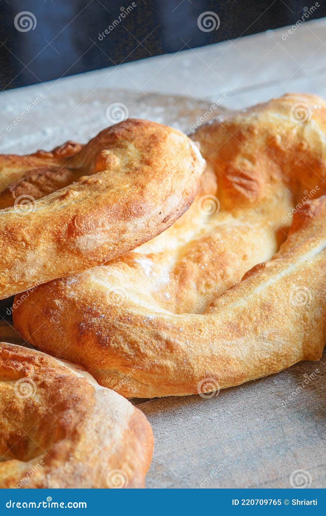 Three Loaves of Armenian Matnakash Bread on Kitchen Table Stock Image ...