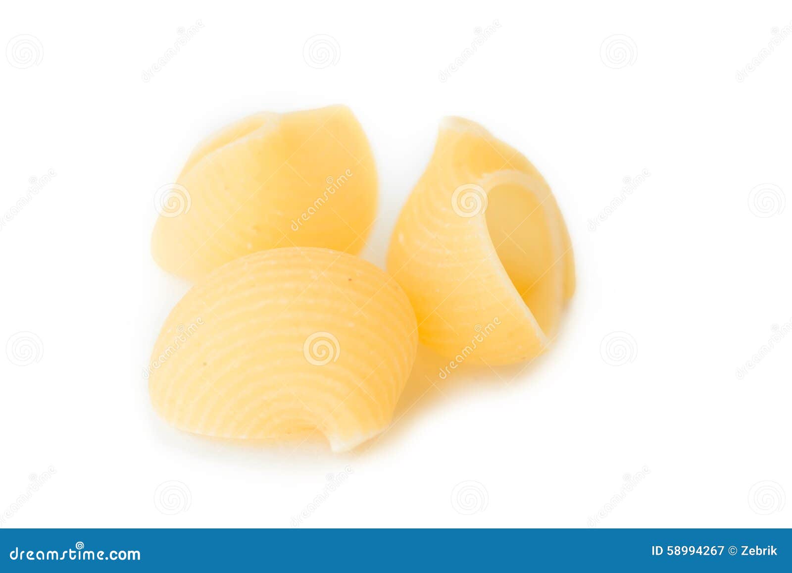 Three of Macaroni Shells, Selective Focus. Isolated on White. Stock ...
