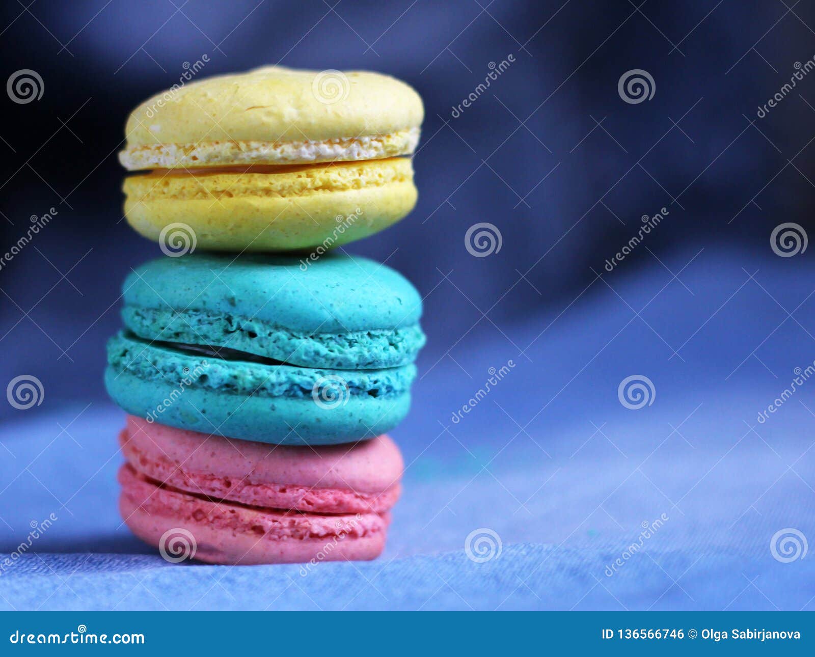 Three Macaroons on a Blue Background Stock Photo - Image of background ...