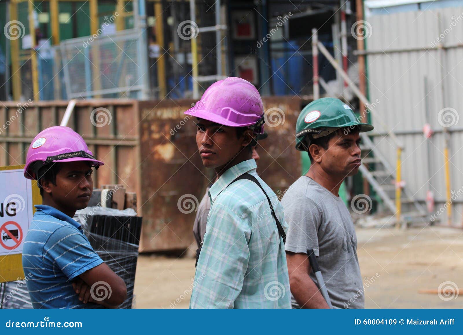 Three Male Construction Workers at a Construction Site Editorial Stock ...