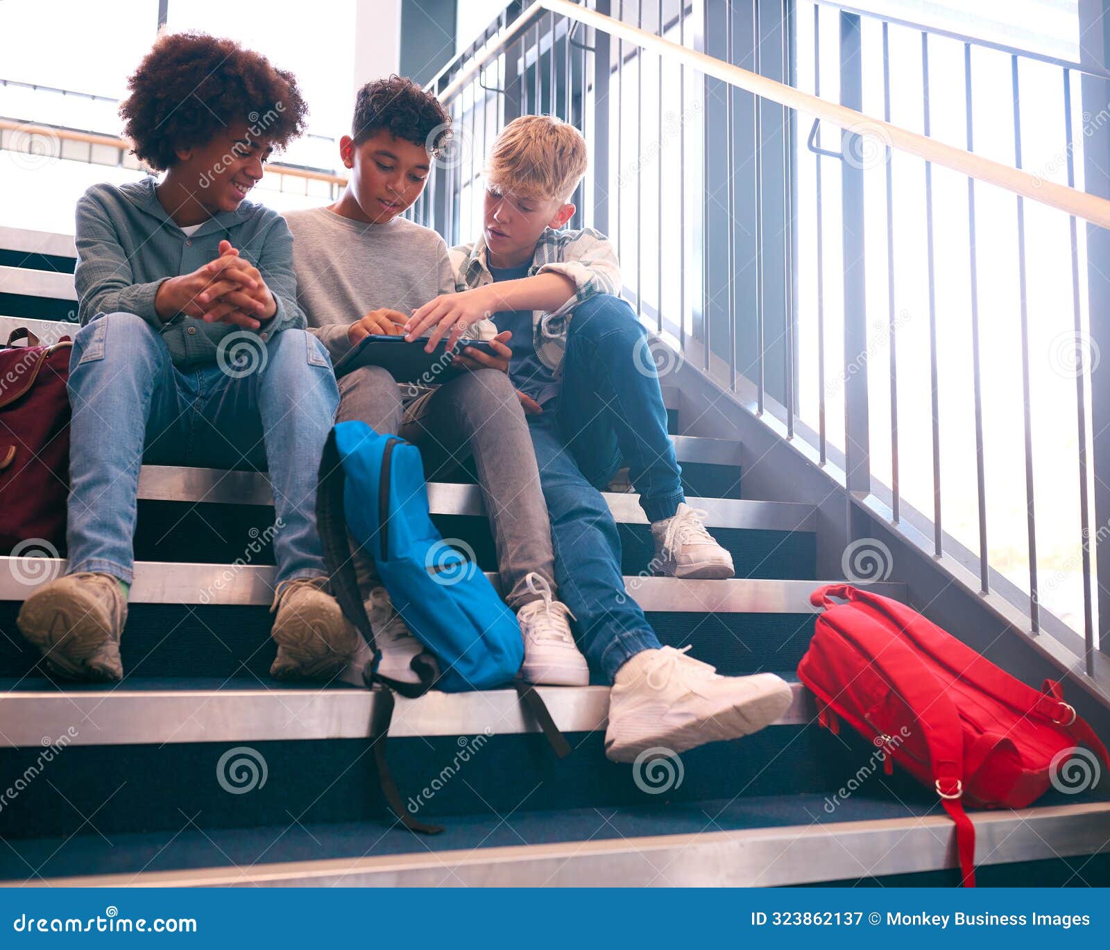 Three Male Secondary or High School Pupils Inside School Building on ...