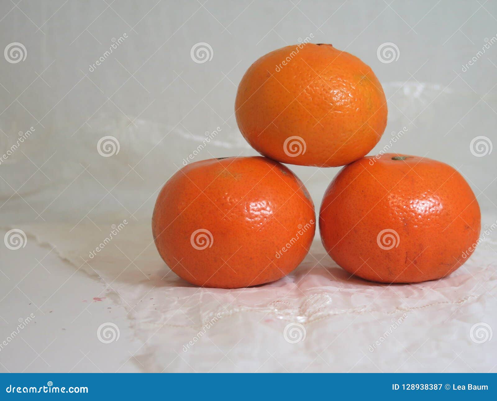 Three mandarins oranges stock image. Image of colors - 128938387