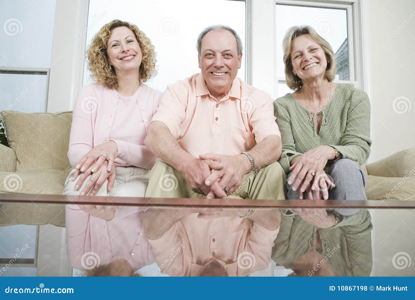 Three Mature Friends at Home Stock Photo - Image of sofa, reflection ...