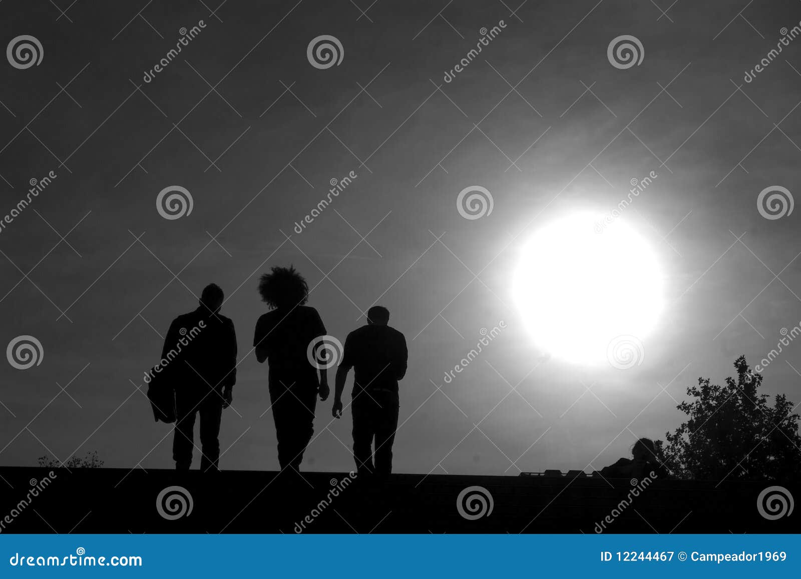 Three men in back light stock image. Image of silhouette - 12244467