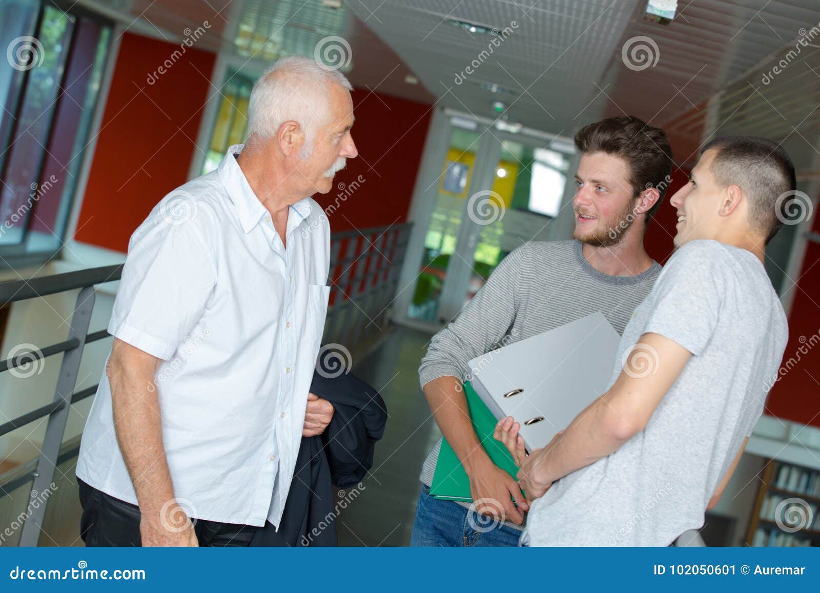 Three Men Having Conversation on Hallway Stock Image - Image of casual ...