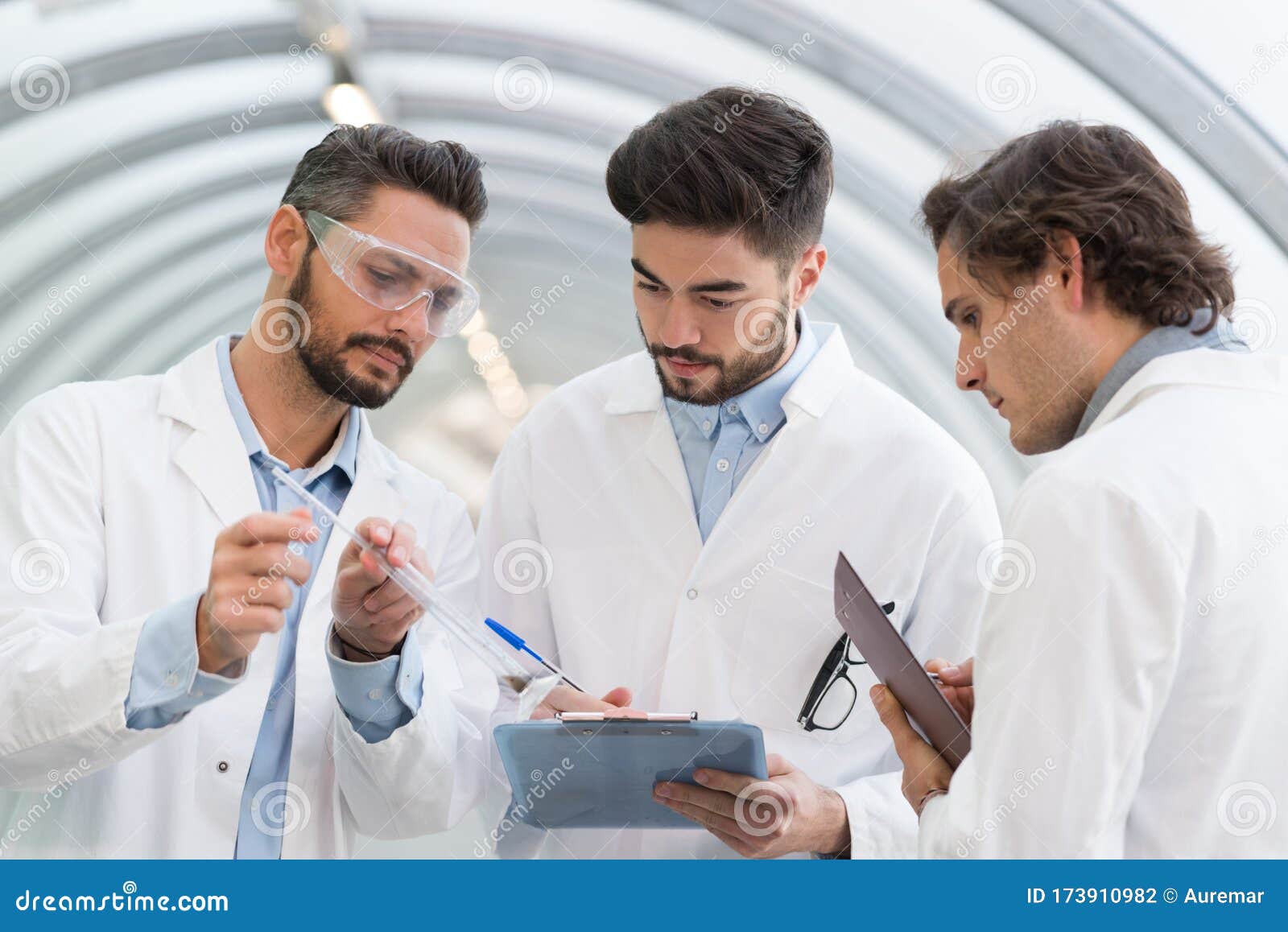 Three Men in Labcoats in Discussion Stock Photo - Image of scientific ...