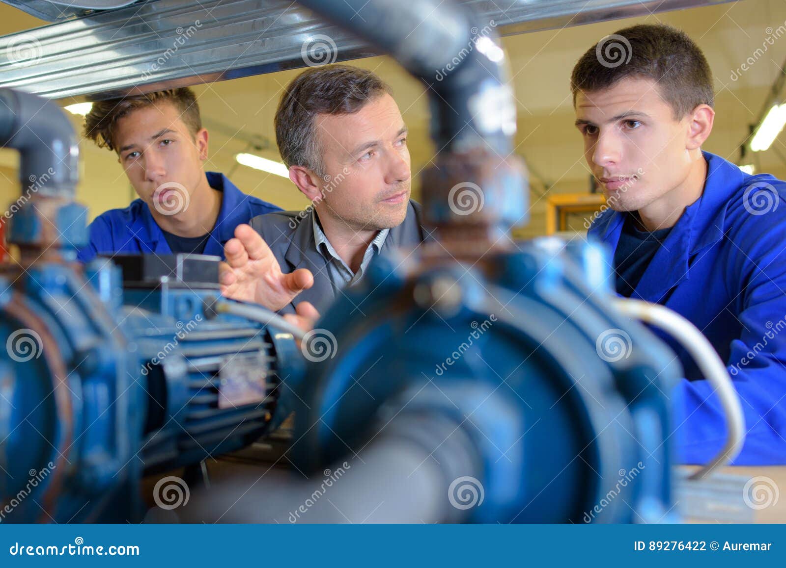Three men and motor stock photo. Image of teenager, male - 89276422
