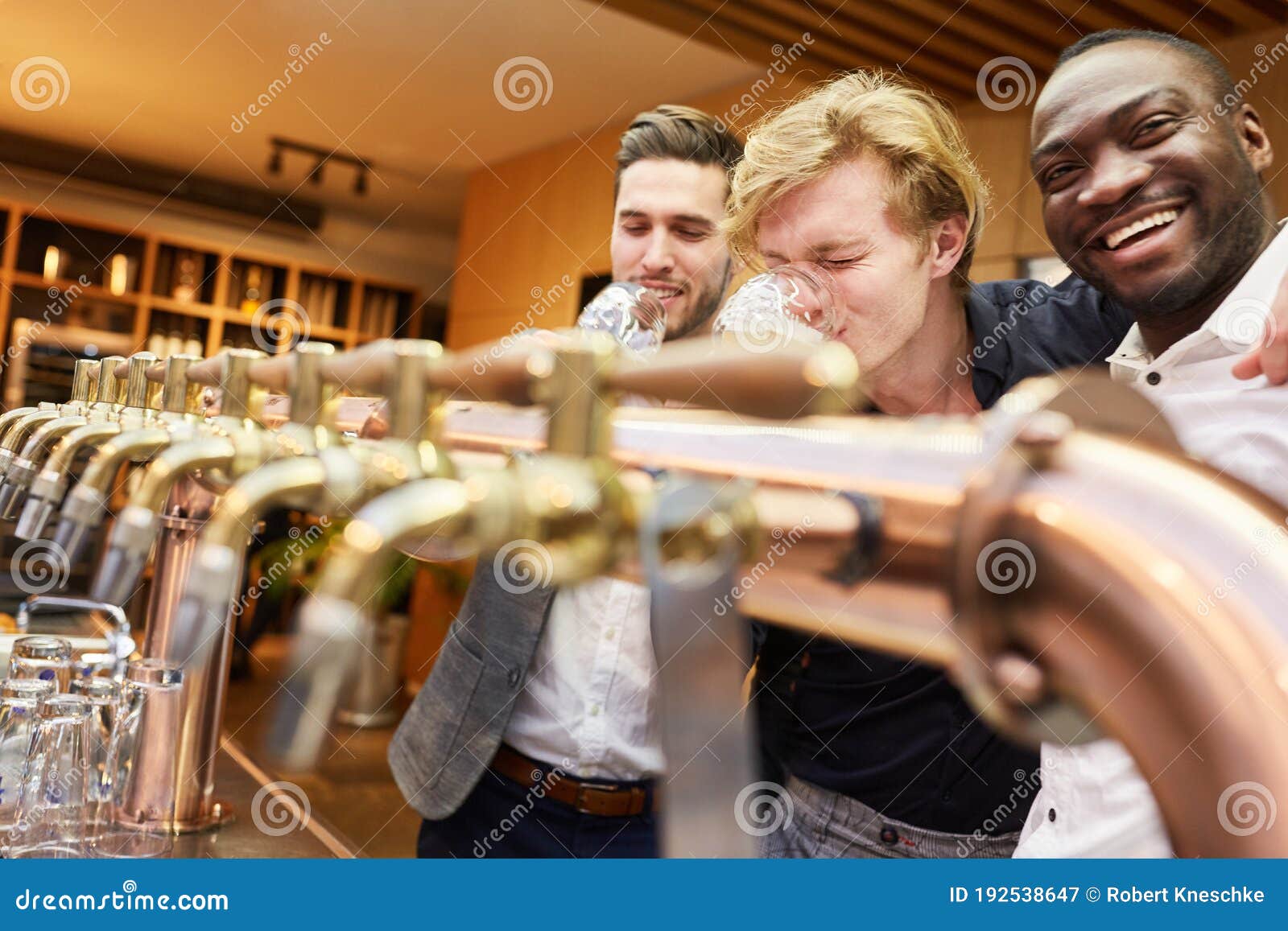 Three Men in a Pub Drinking Beer Stock Image - Image of beer, happy ...