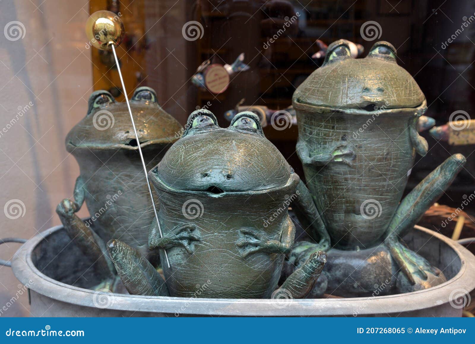 Three Metal Frogs with Christmas Golden Ball Stock Image - Image of ...