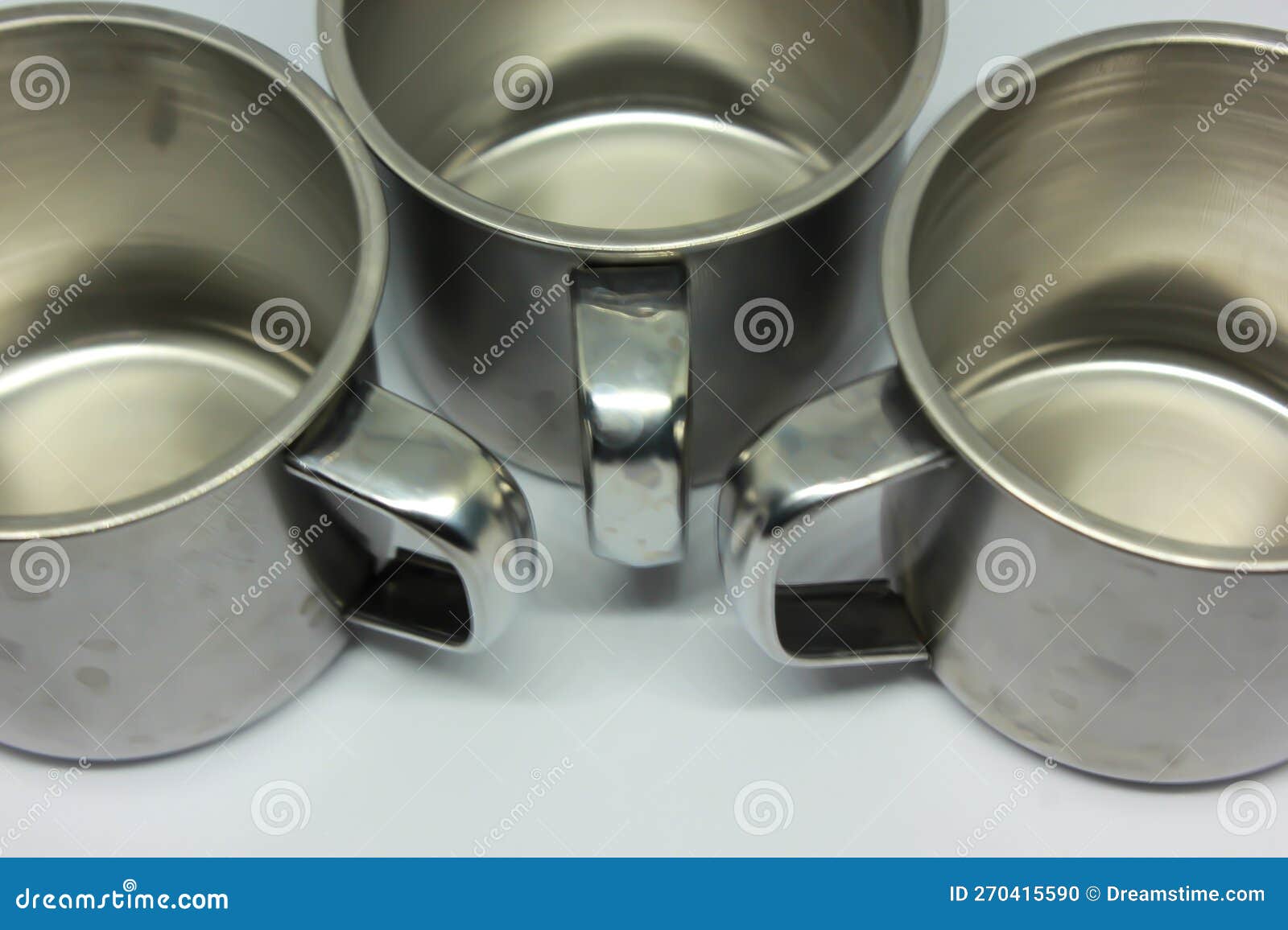 Three Metal Glasses Photographed from the Top Angle Stock Photo - Image ...