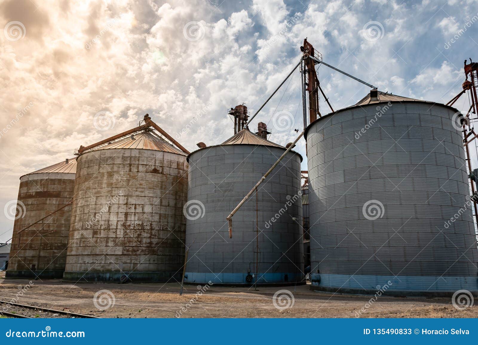 Grain From Silos Being Loaded Onto Cargo Ship On Stock Image ...