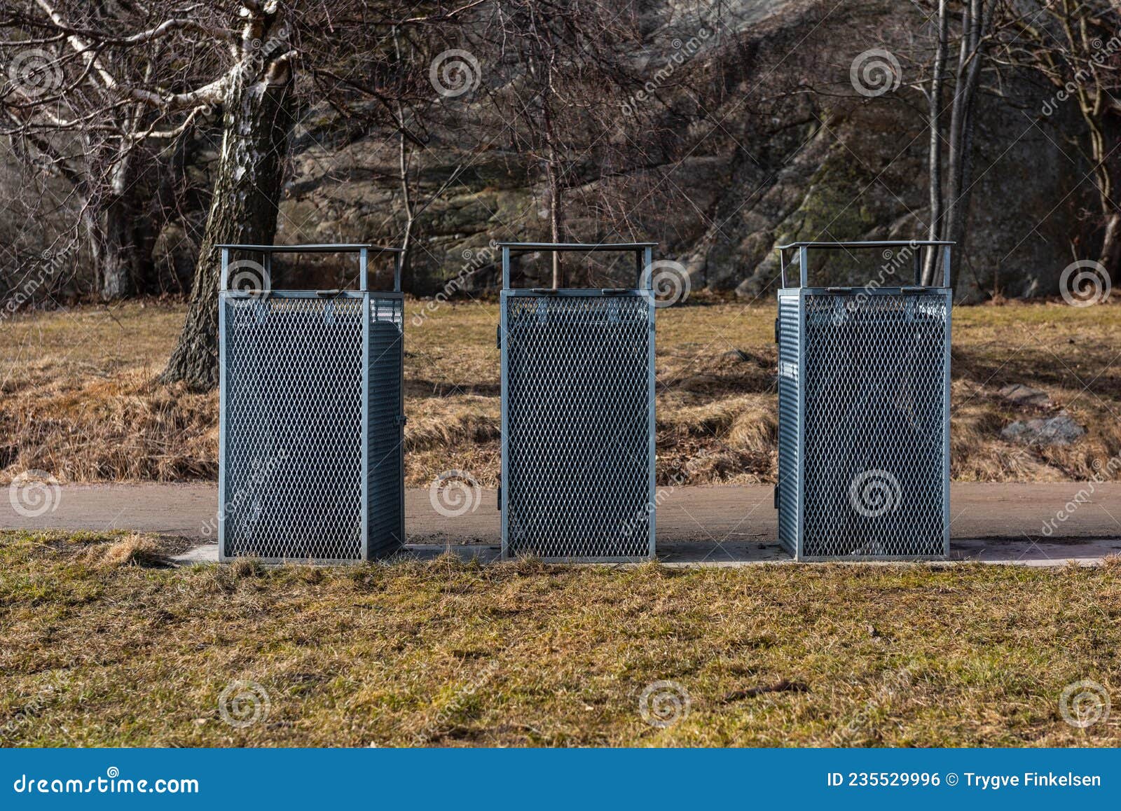 Three Metal Trash Cans in a Row Stock Photo - Image of concept, city ...
