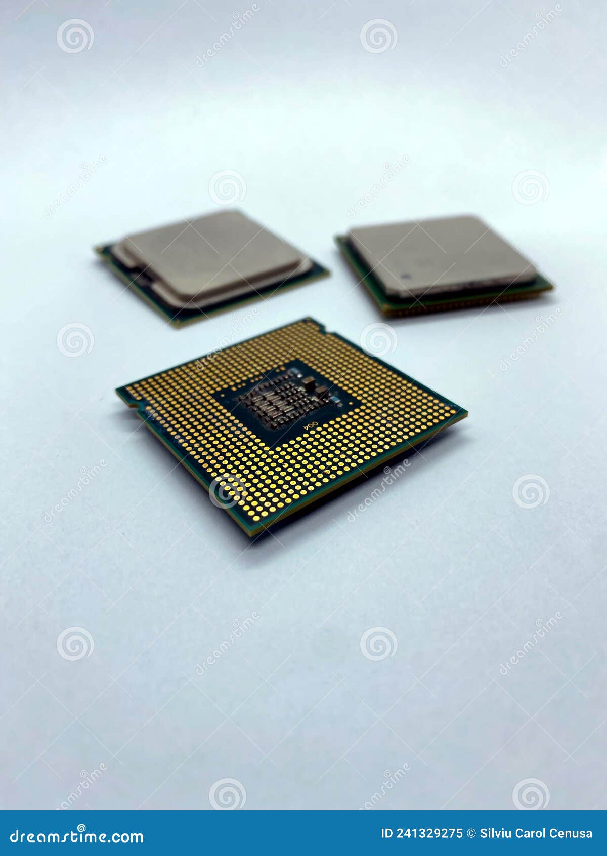 Three Micro Processors Closeup View Isolated on White Stock Image ...