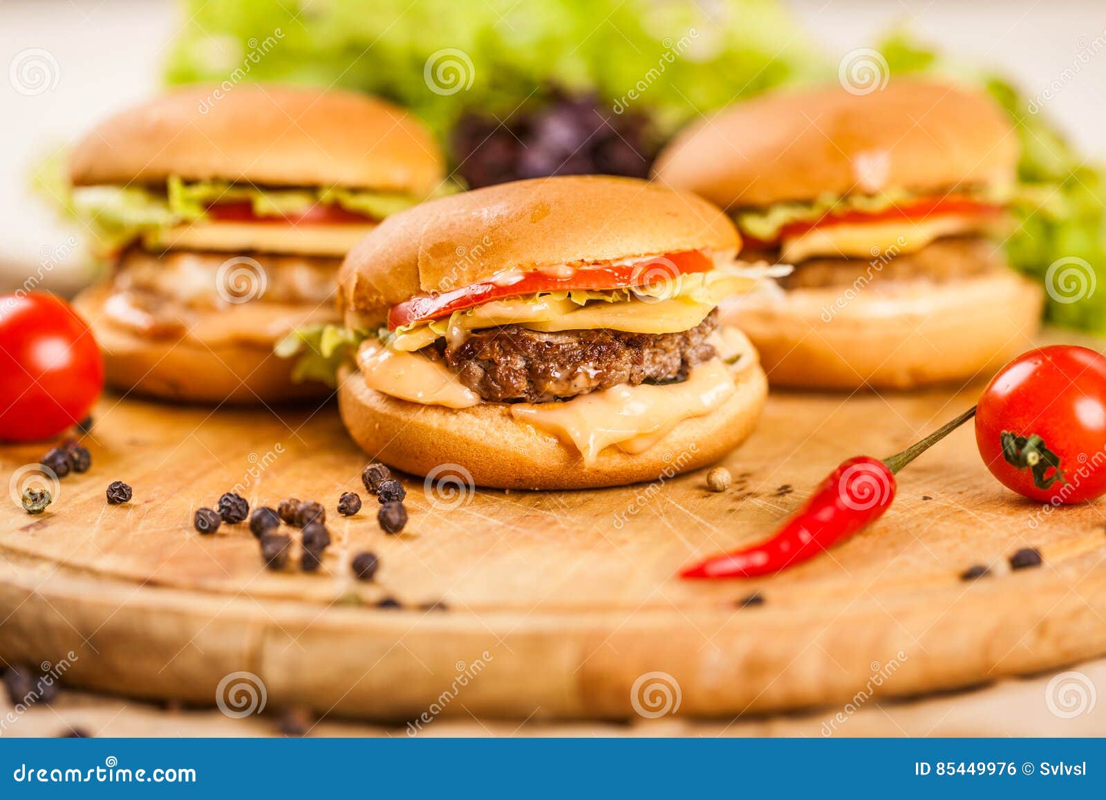 Three mini burgers stock photo. Image of ready, junk - 85449976
