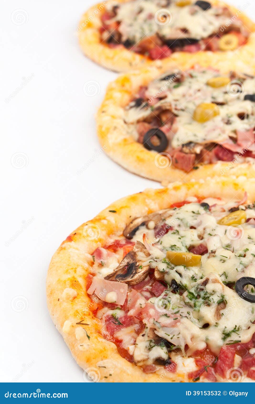 Three Mini Pizzas in a Row stock photo. Image of bacon - 39153532