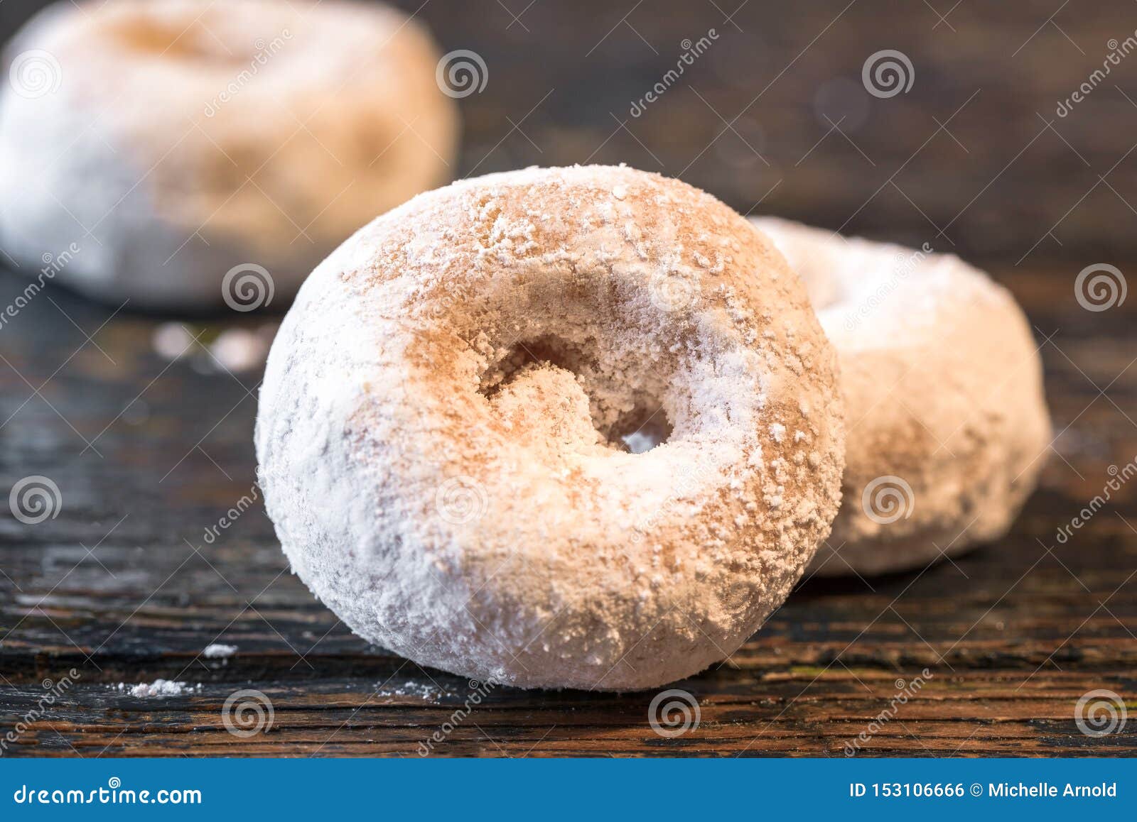 Three Mini Powdered Sugar Doughnuts Stock Photo - Image of macro, three ...