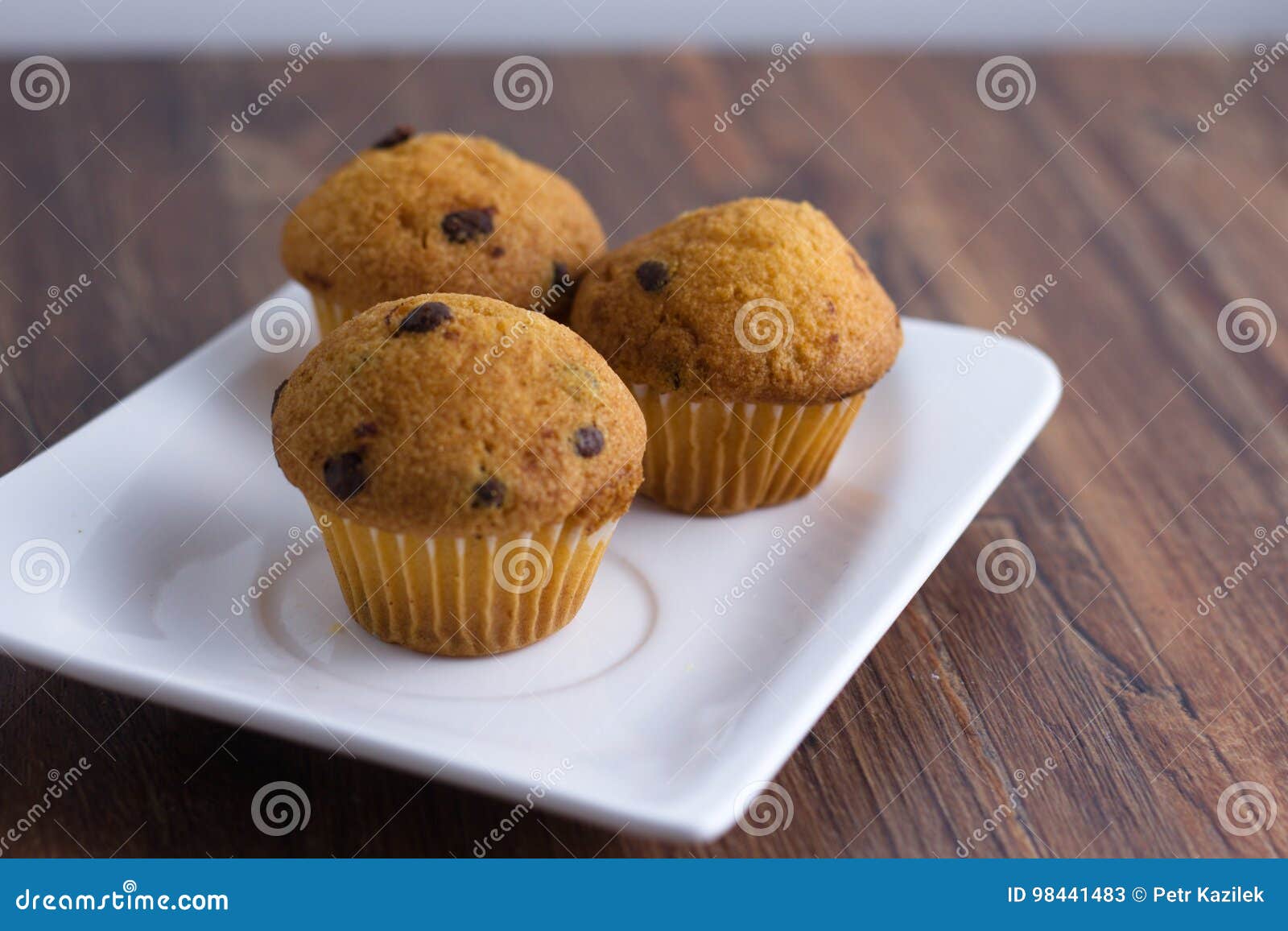 Three Miniature Muffins on Rectangular Plate Stock Image - Image of ...