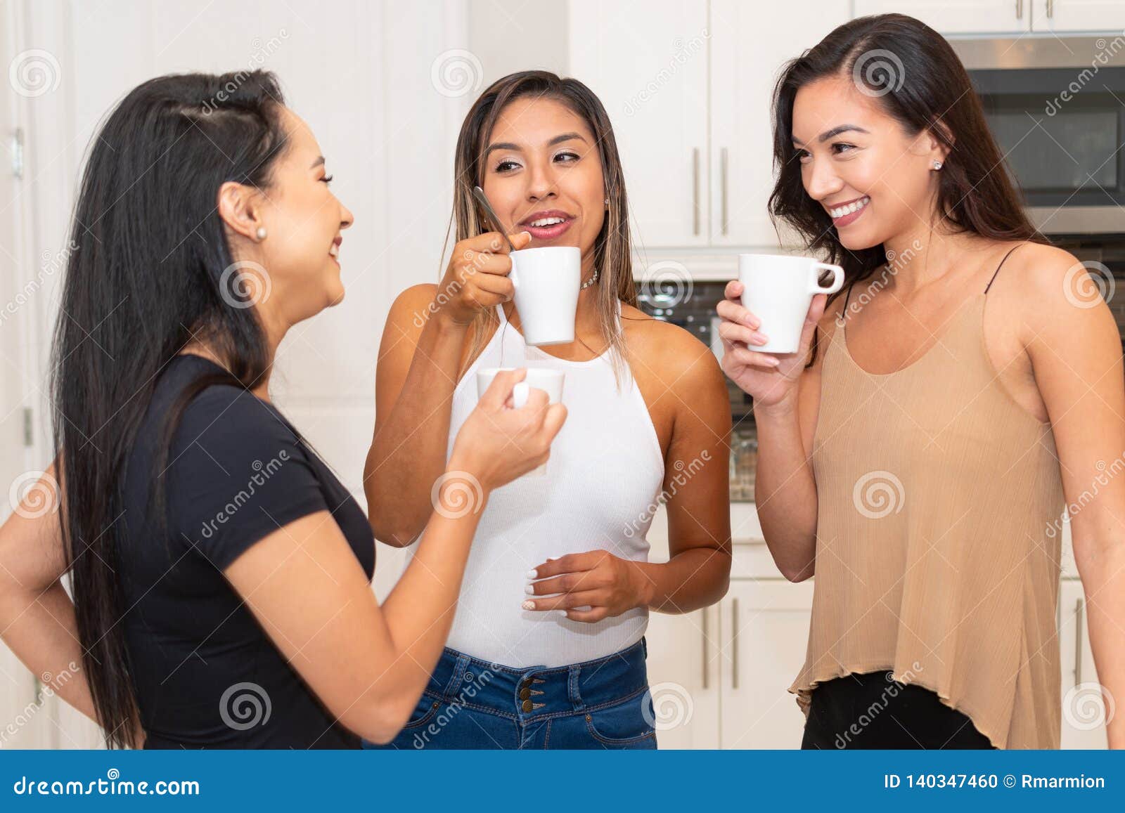 Three Moms in the Kitchen stock photo. Image of young - 140347460