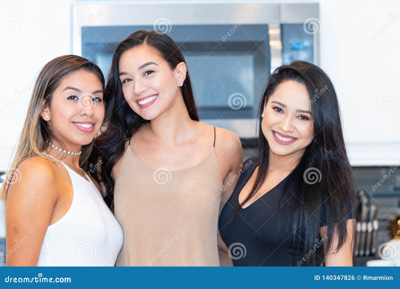 Three Moms in the Kitchen stock photo. Image of beautiful - 140347826