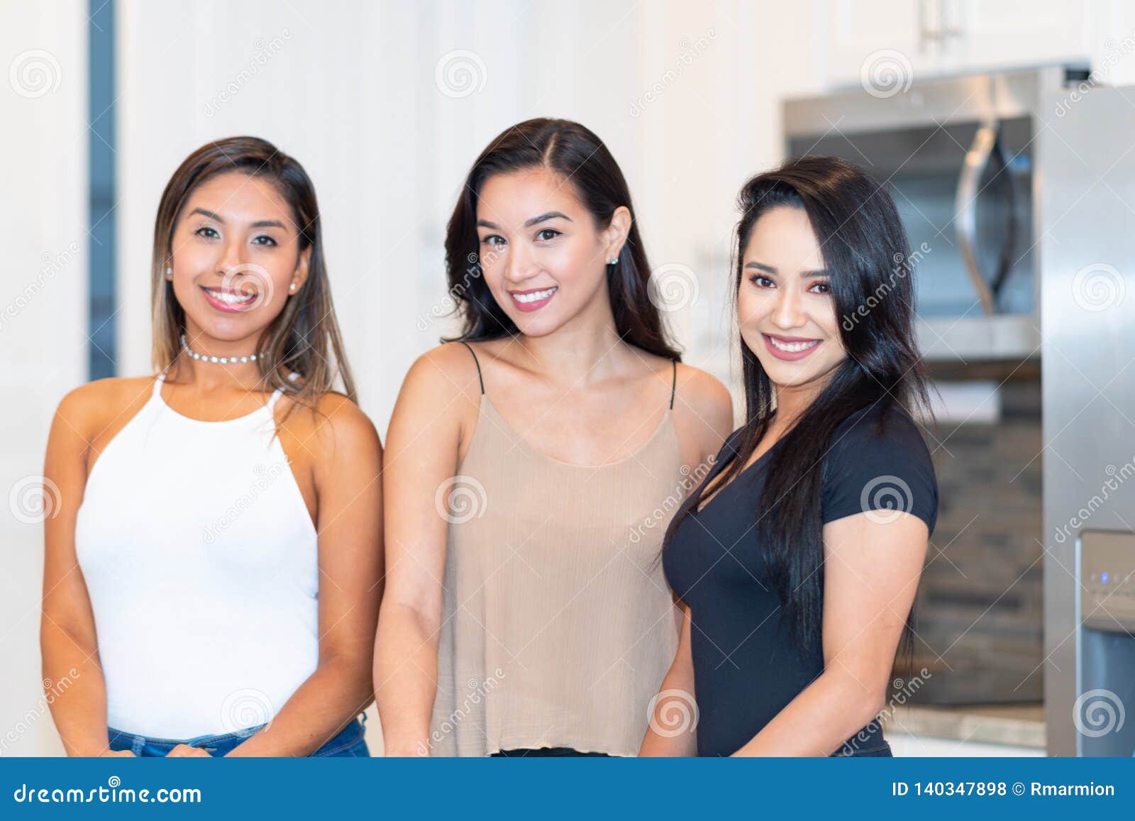 Three Moms in the Kitchen stock photo. Image of beautiful - 140347898