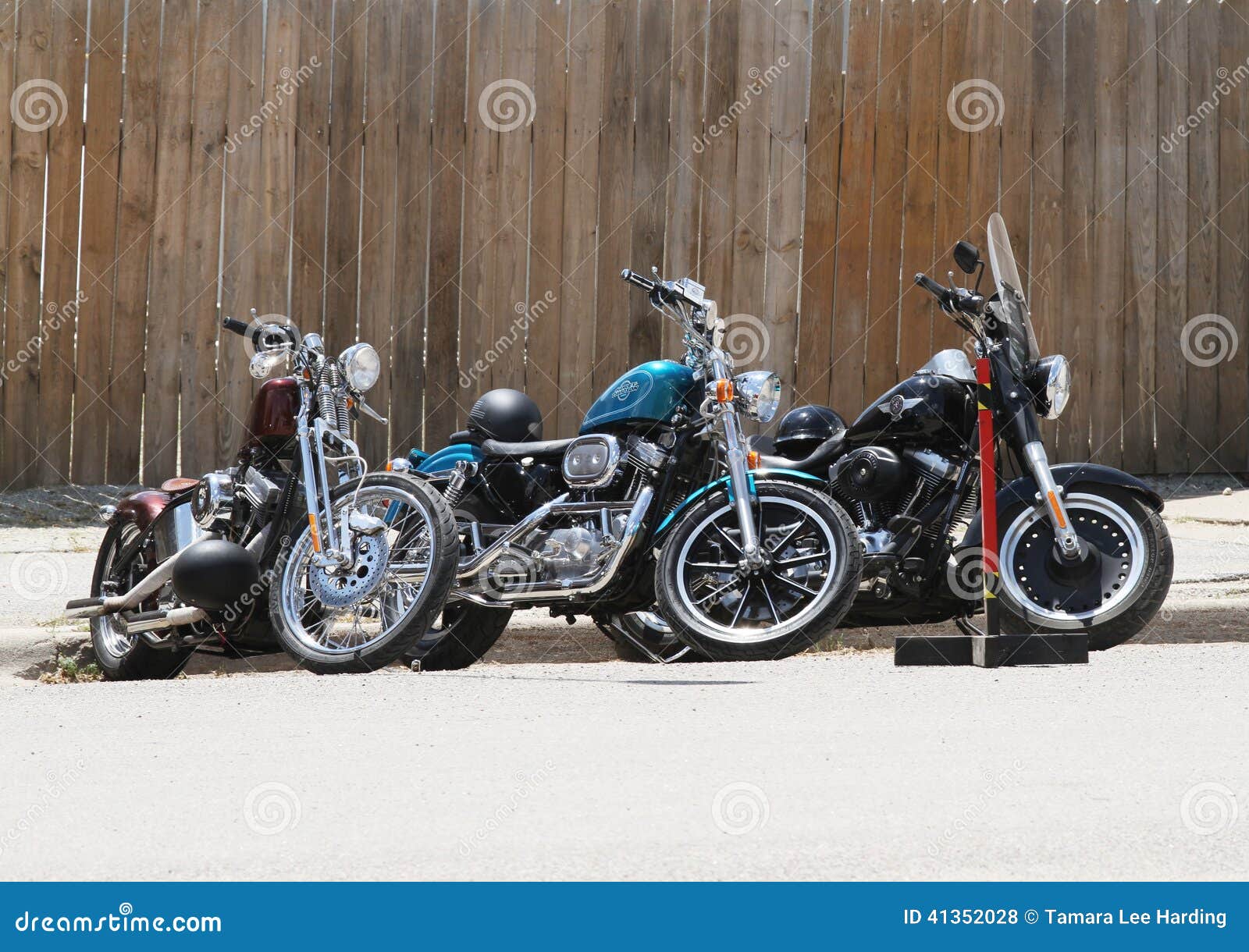 Three Motorcycles Parked by Wooden Fence Editorial Stock Photo - Image ... Three Motorcycles Parked by Wooden Fence Editorial Stock Photo - Image ...