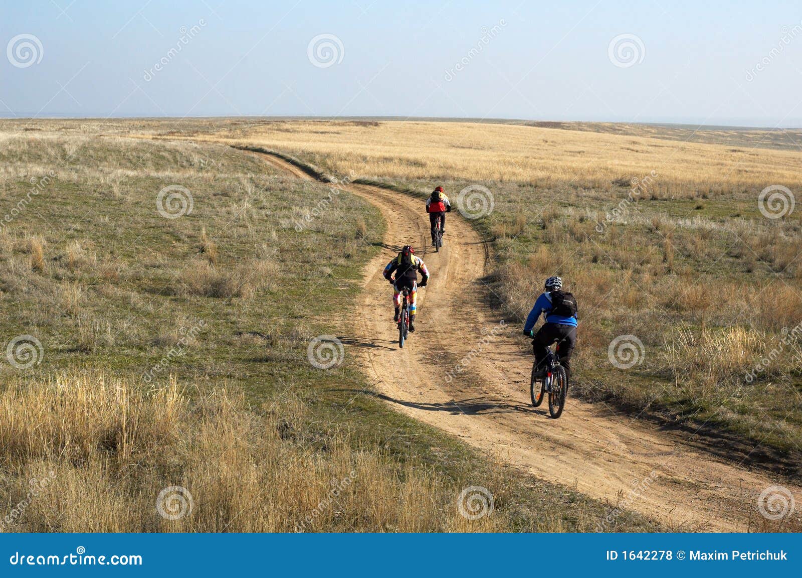 Three mountain bikers stock photo. Image of explode, bike - 1642278