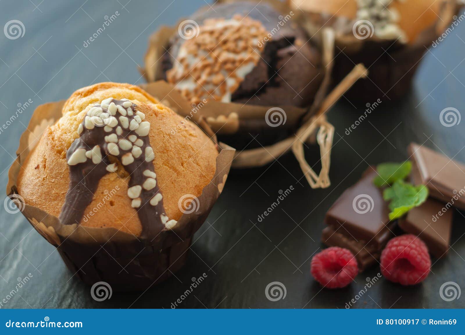 Three Muffin with Raspberries and Chocolate Stock Image - Image of ...