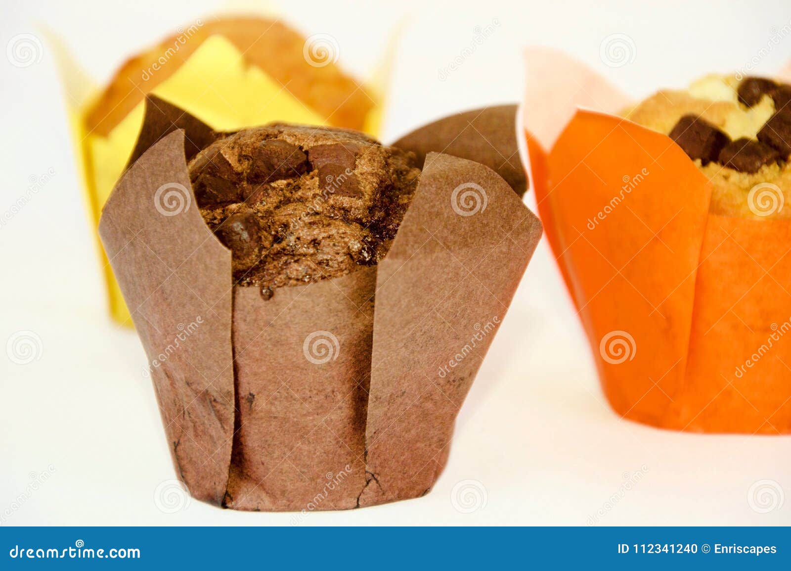 Three Muffins Isolated on White Background Stock Photo - Image of brown ...