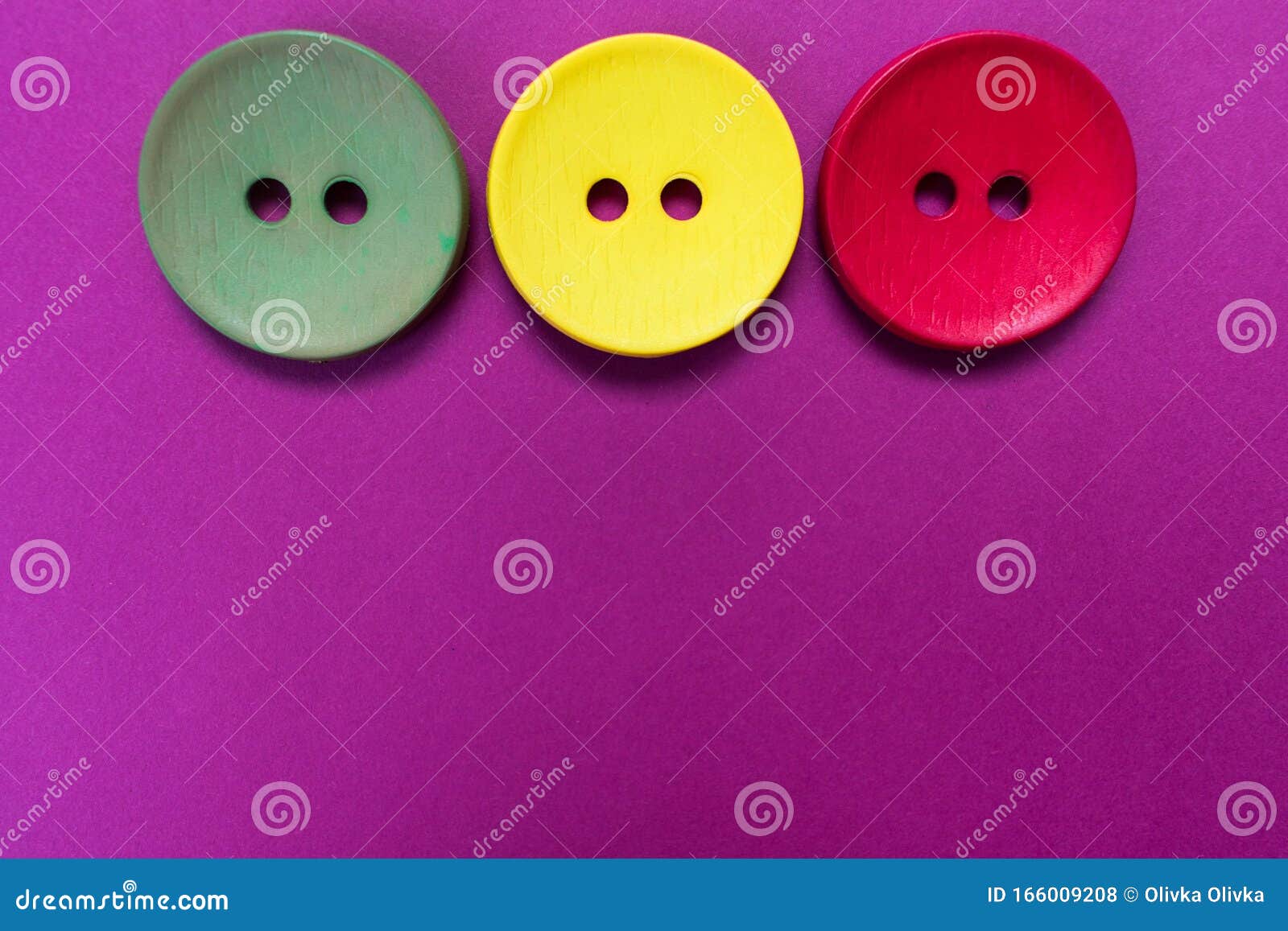 Three Large Multi-colored Buttons on a Pink Background. Copy Space ...