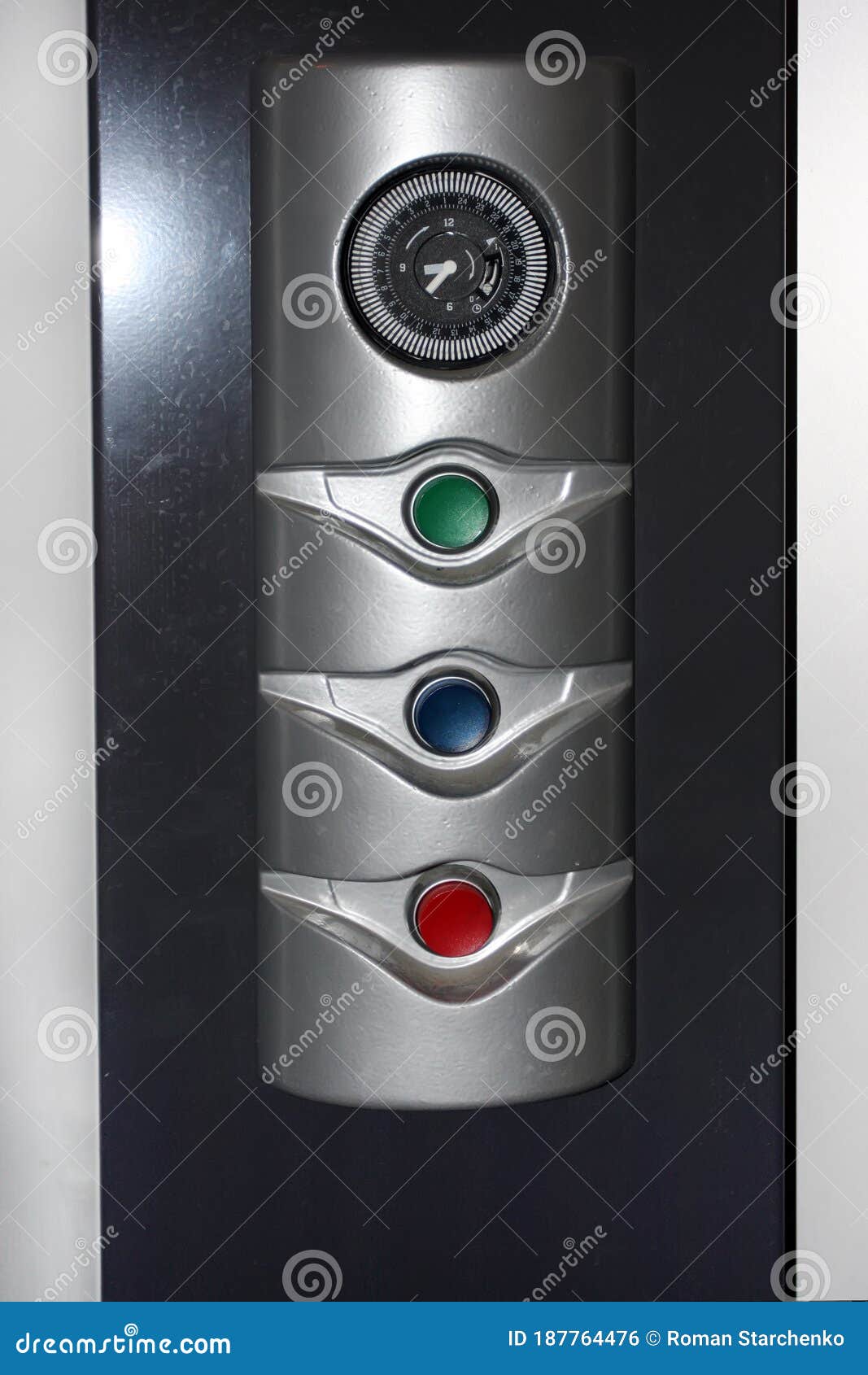 Three Multi-colored Buttons with a Timer on a Chrome Panel Stock Photo ...