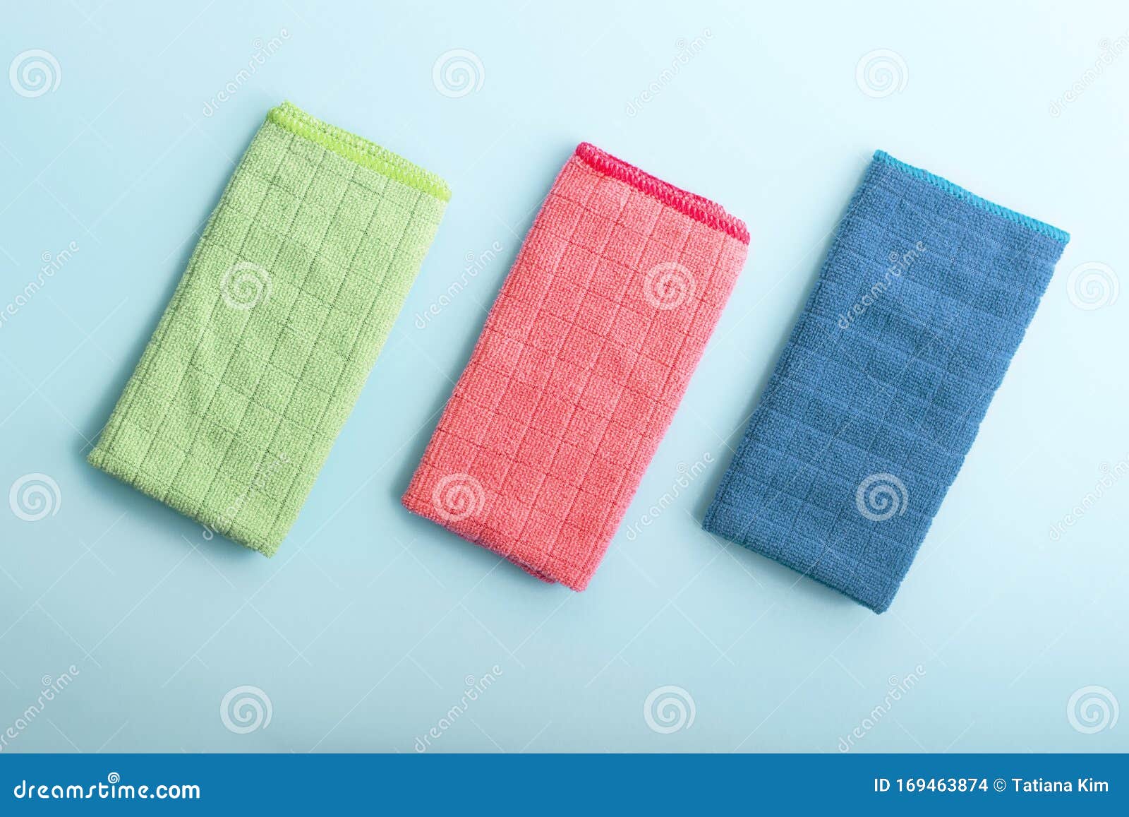 Three Multi-colored Microfiber Rags on Blue Background, Concert ...