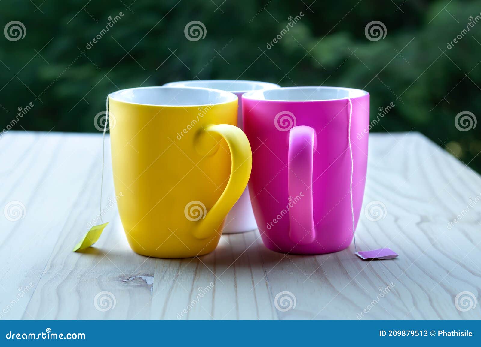 Three Multi Coloured Mugs with Tea Stock Image - Image of yellow ...