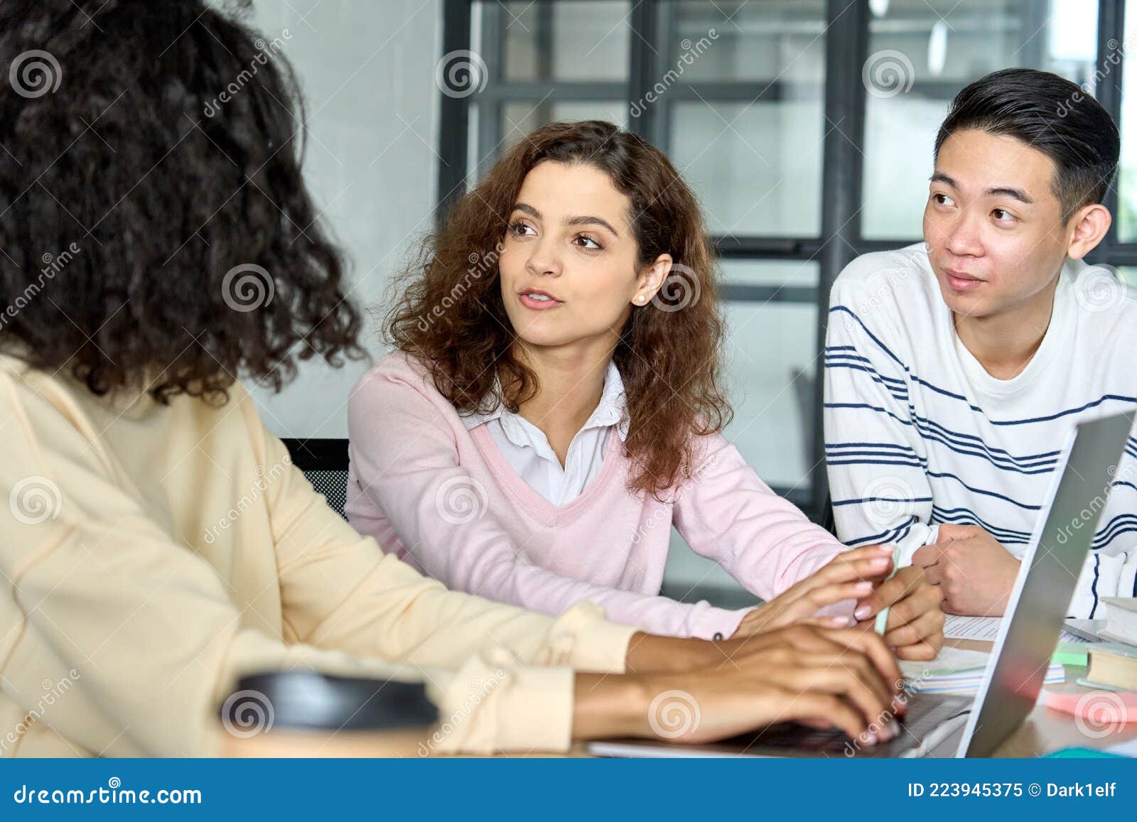 Three Multicultural Students Talking on Project in Contemporary Office ...