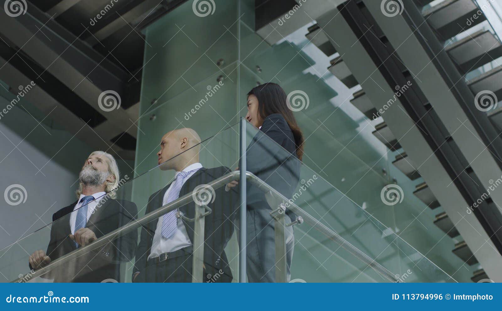 Multinational Corporate Executives Discussing Business in Modern Stock ...