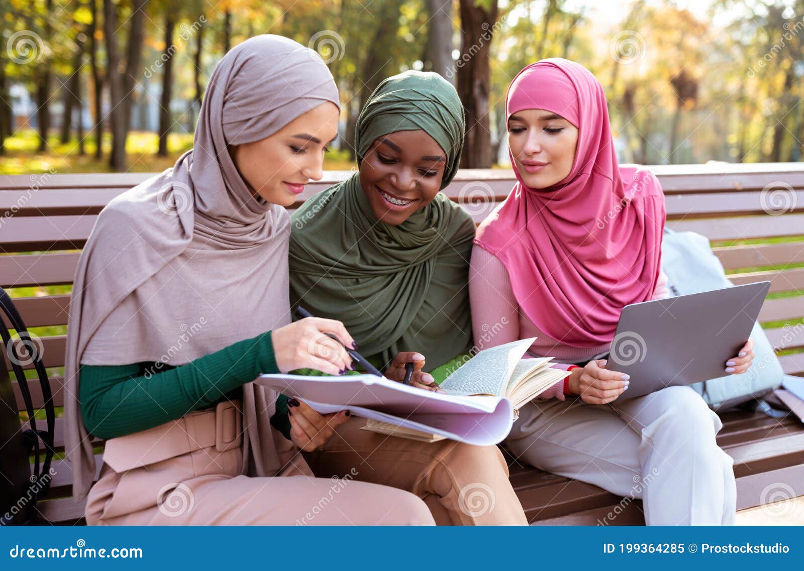 Three Muslim Students Women Learning Together Using Computer Sitting ...