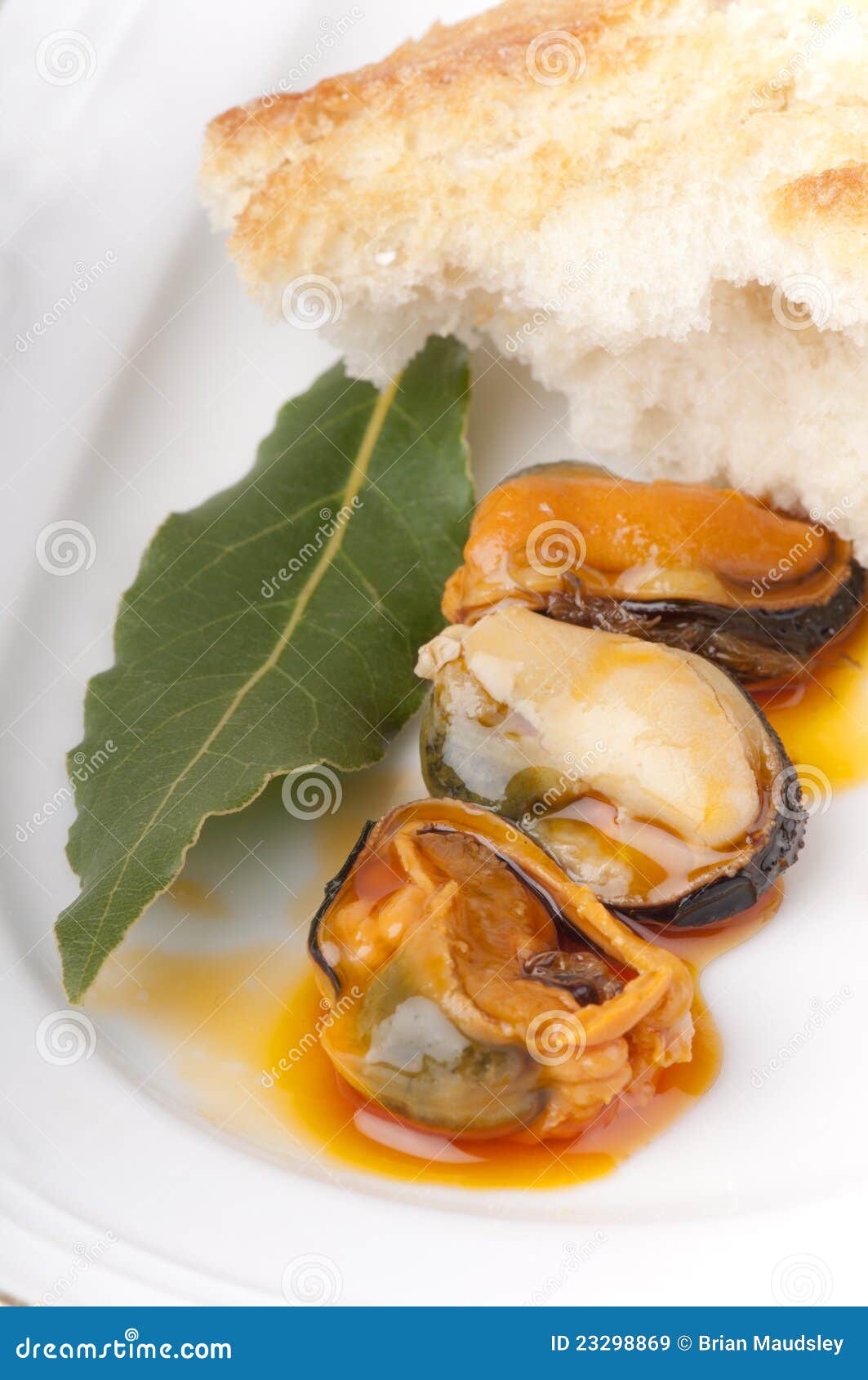Three Mussels with Bread and a Bay Leaf. Stock Image - Image of ...