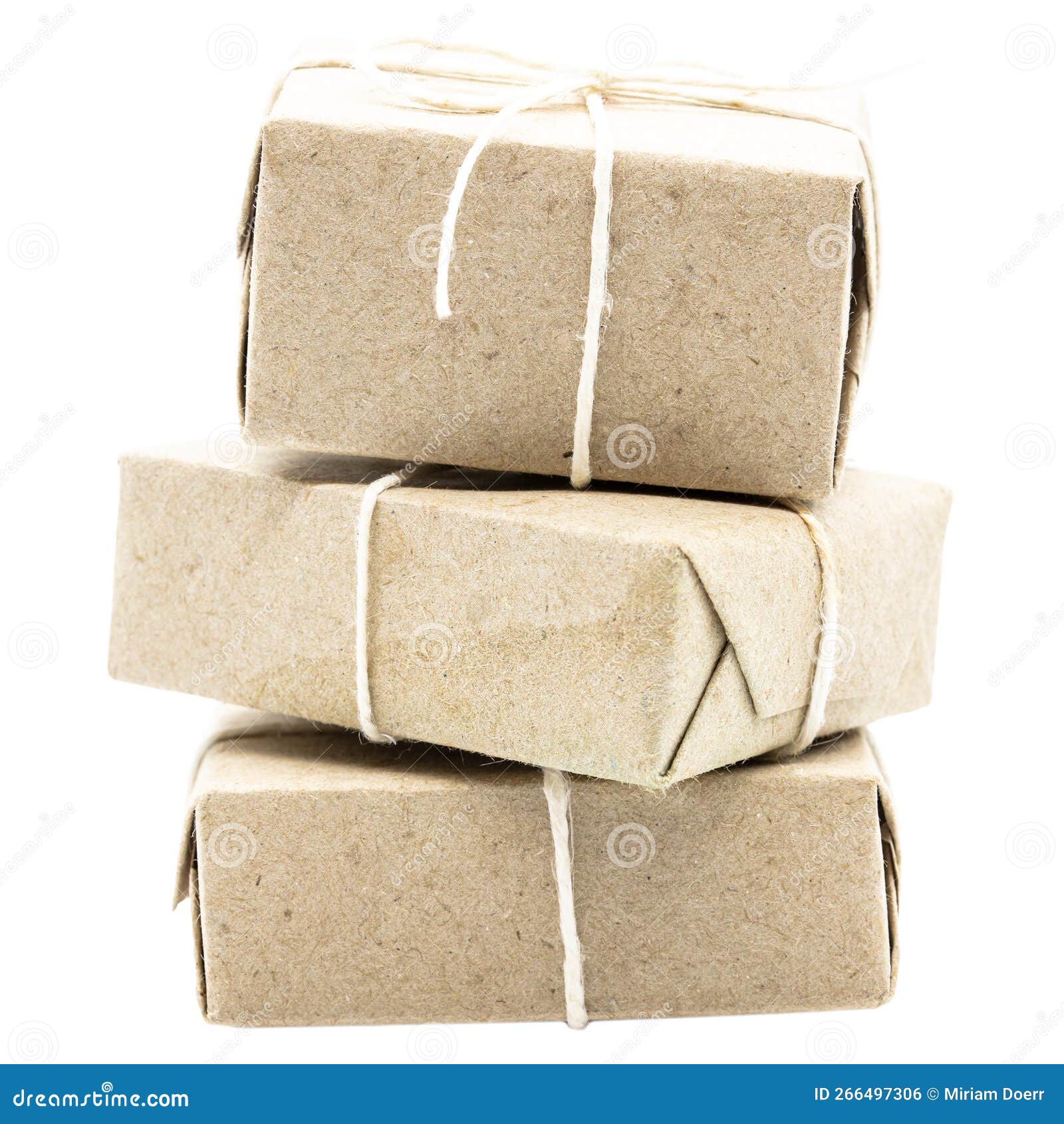 Three Natural Brown Gift Boxes or Parcels with Cord Ribbon Stock Photo ...