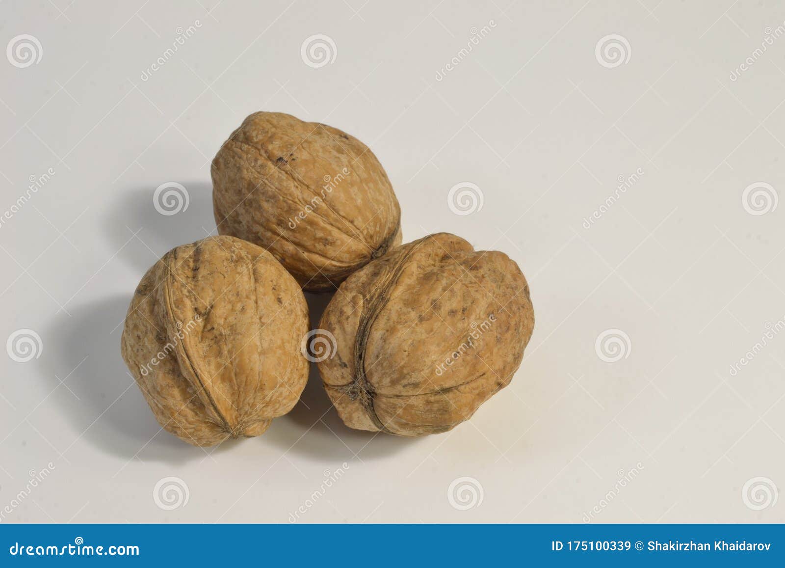 Three natural walnuts on stock image. Image of tasty - 175100339
