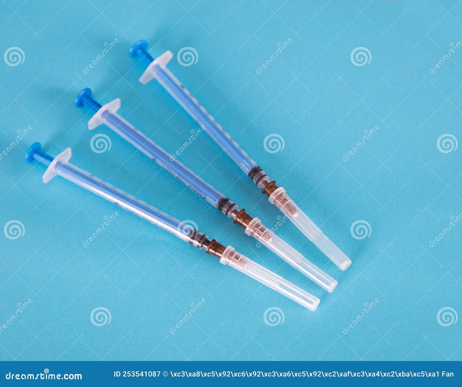 Three Needles on a Blue Background Stock Image - Image of tube ...