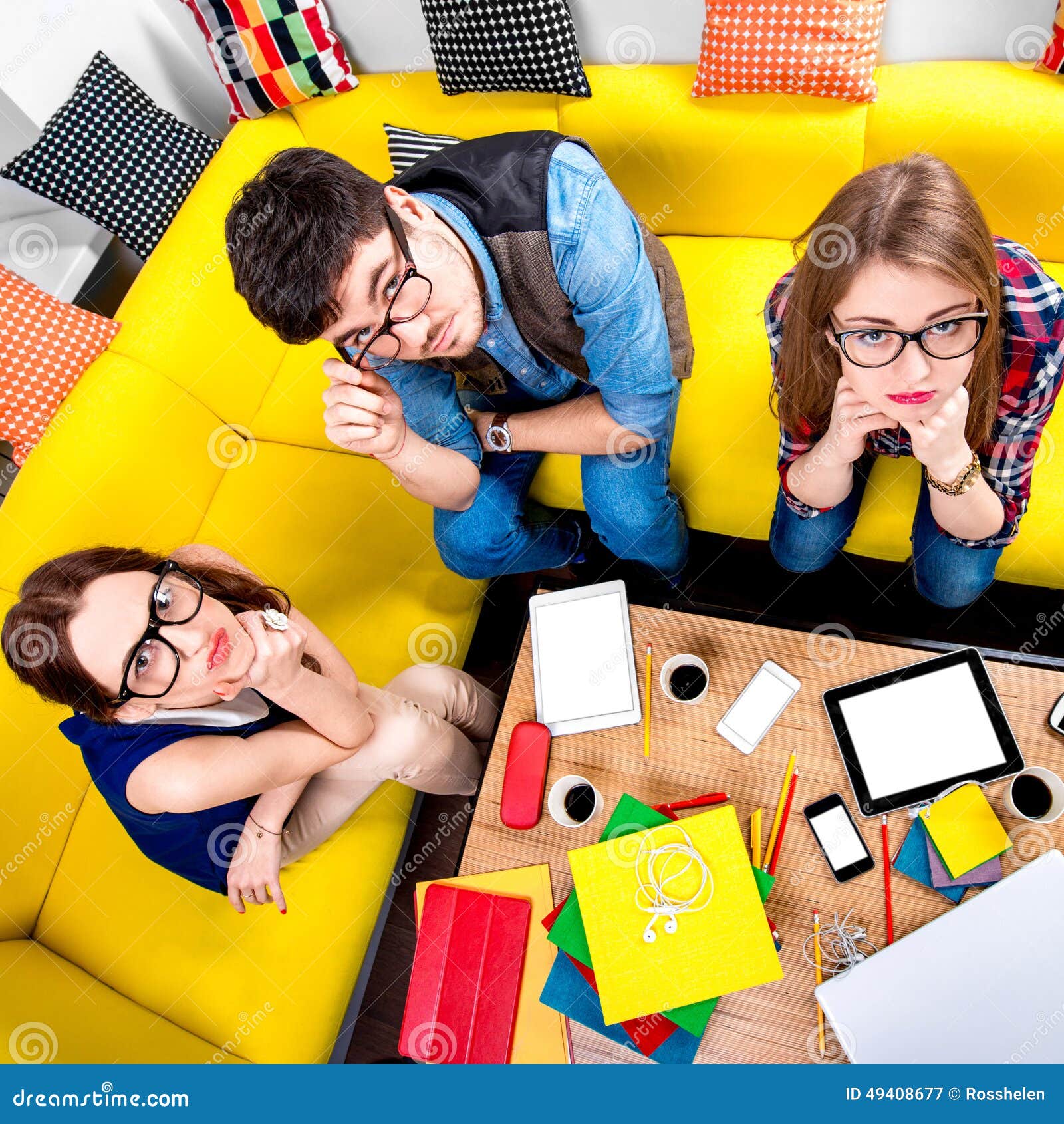 Three nerds on the couch stock image. Image of friendly - 49408677