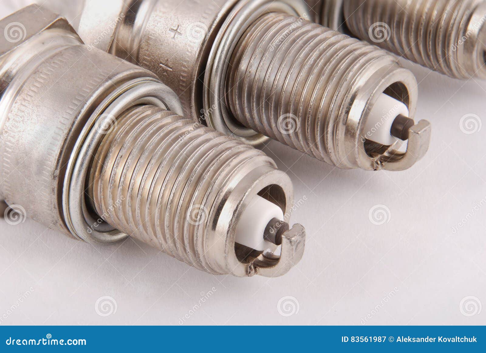 Three new spark plug stock image. Image of shiny, technology - 83561987