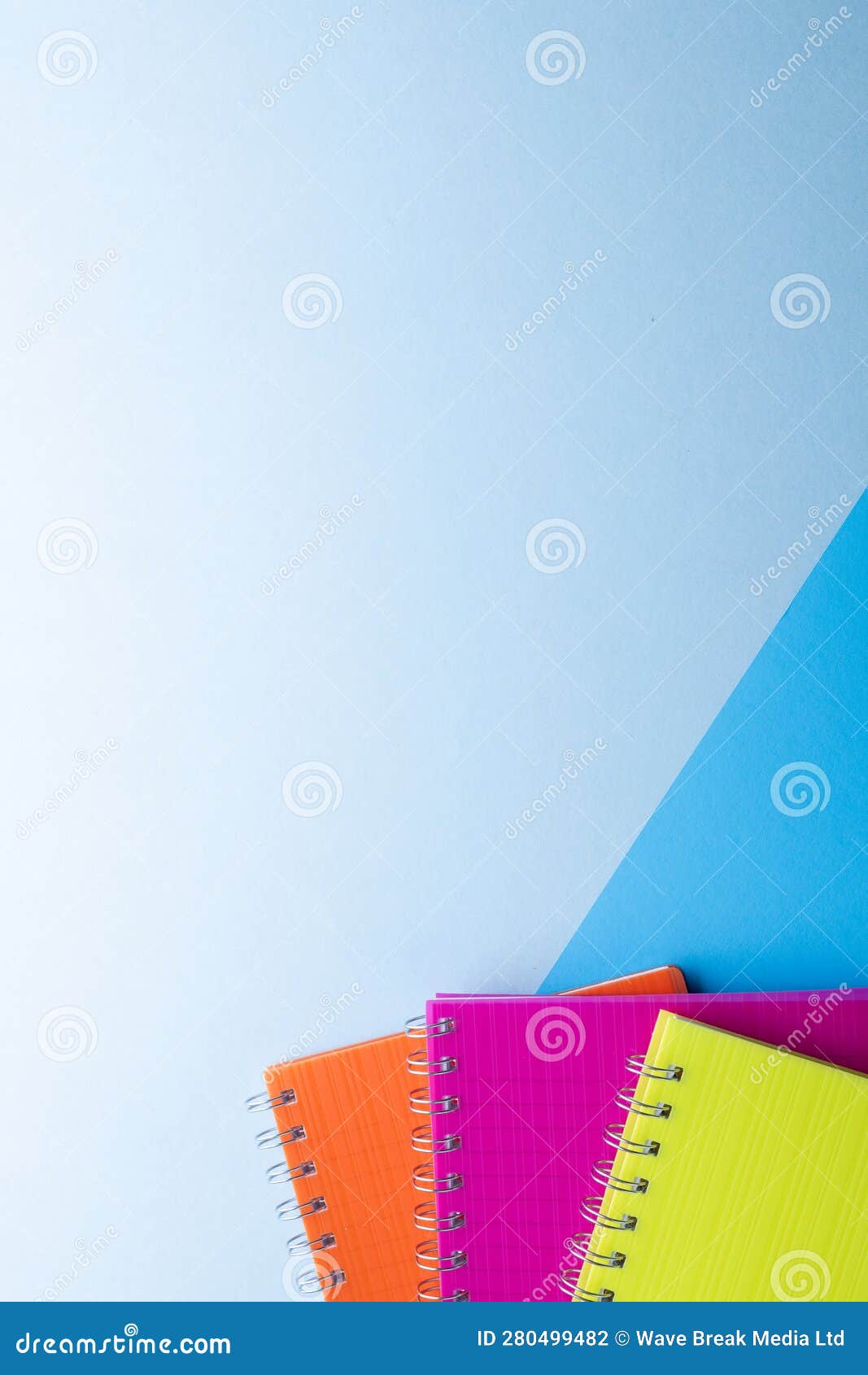Three Notebooks with Binding and Copy Space on Blue Background Stock ...