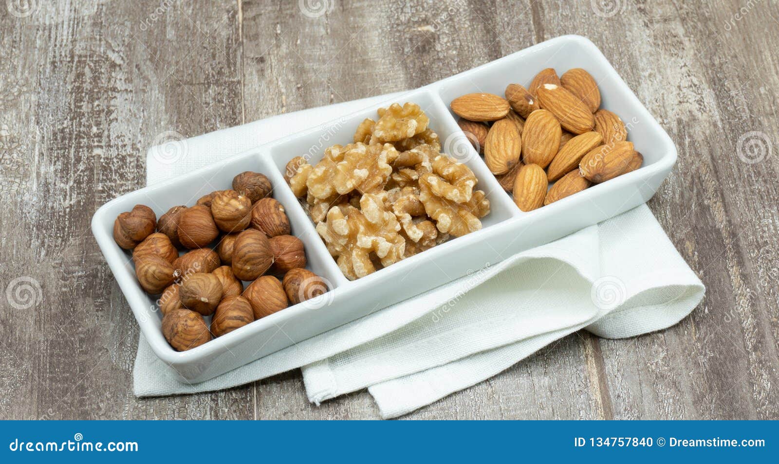 Three Nuts, Hazelnut, Almond and Walnut Stock Photo - Image of macro ...