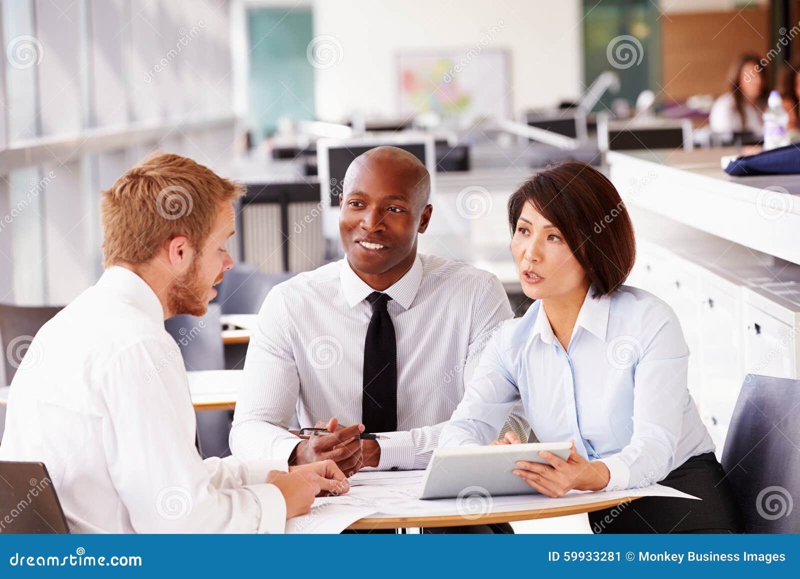 Three Office Colleagues in a Casual Team Meeting Stock Image - Image of ...