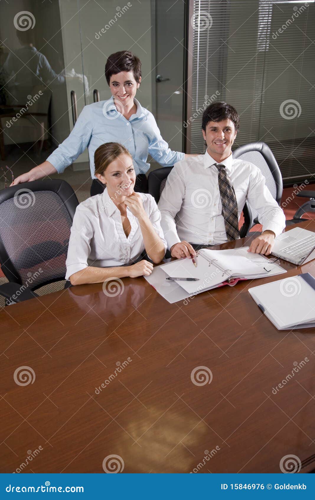 Three Office Workers Working in Boardroom Stock Photo - Image of table ...