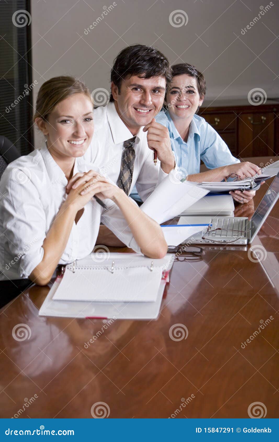 Three Office Workers Working in Boardroom Stock Image - Image of ...