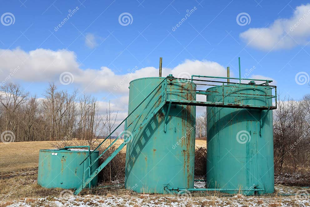 Three oil tanks stock photo. Image of metal, environment - 19352070