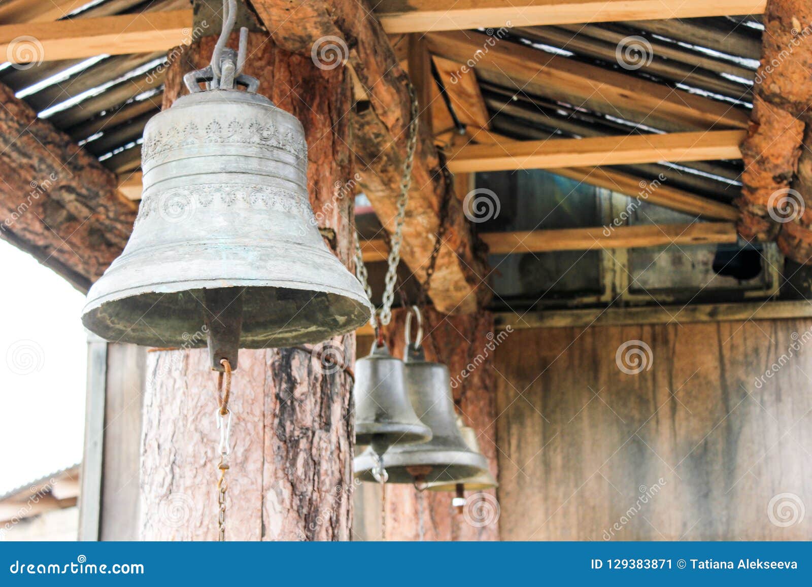 Three old bells stock image. Image of house, hanging - 129383871